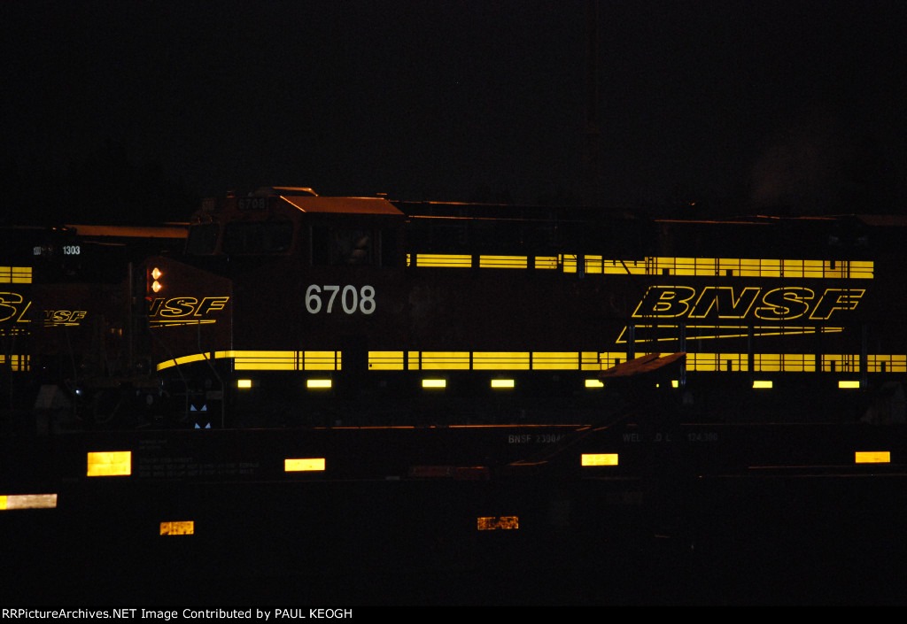 BNSF 6708 reflects her BNSF Swoosh Logo as my flash lights her up.
